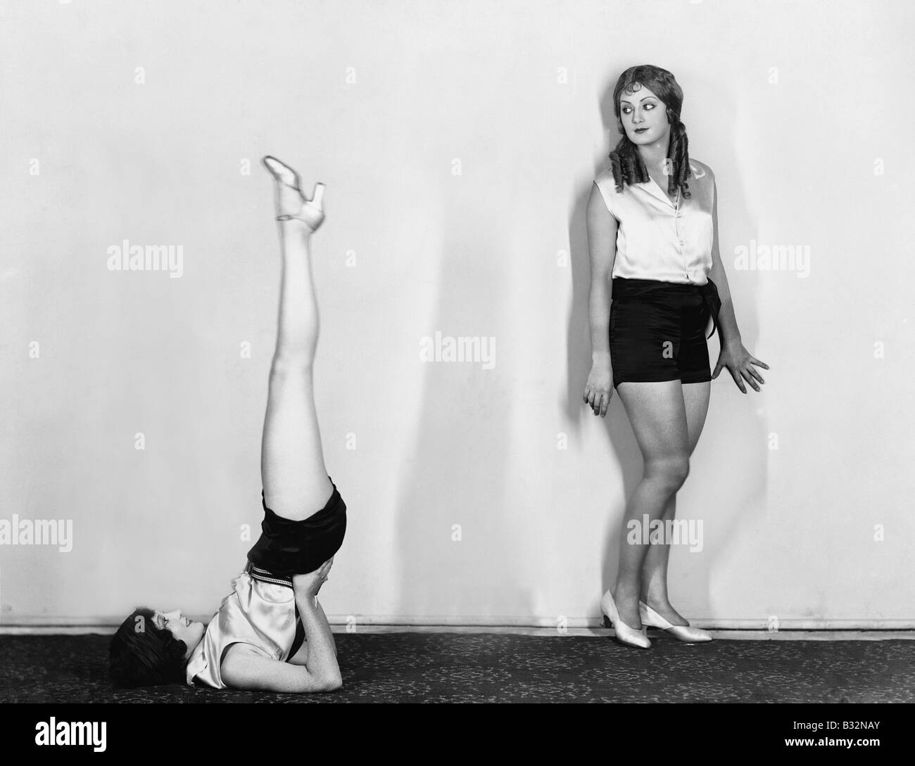 Legs stretching exercises Black and White Stock Photos & Images - Alamy