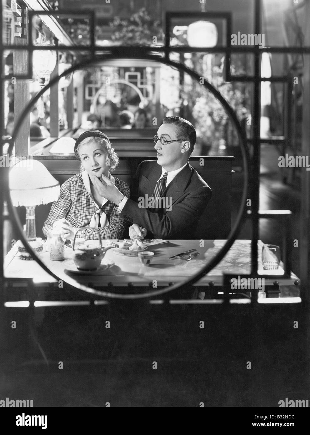 People sitting windows in Black and White Stock Photos & Images - Alamy