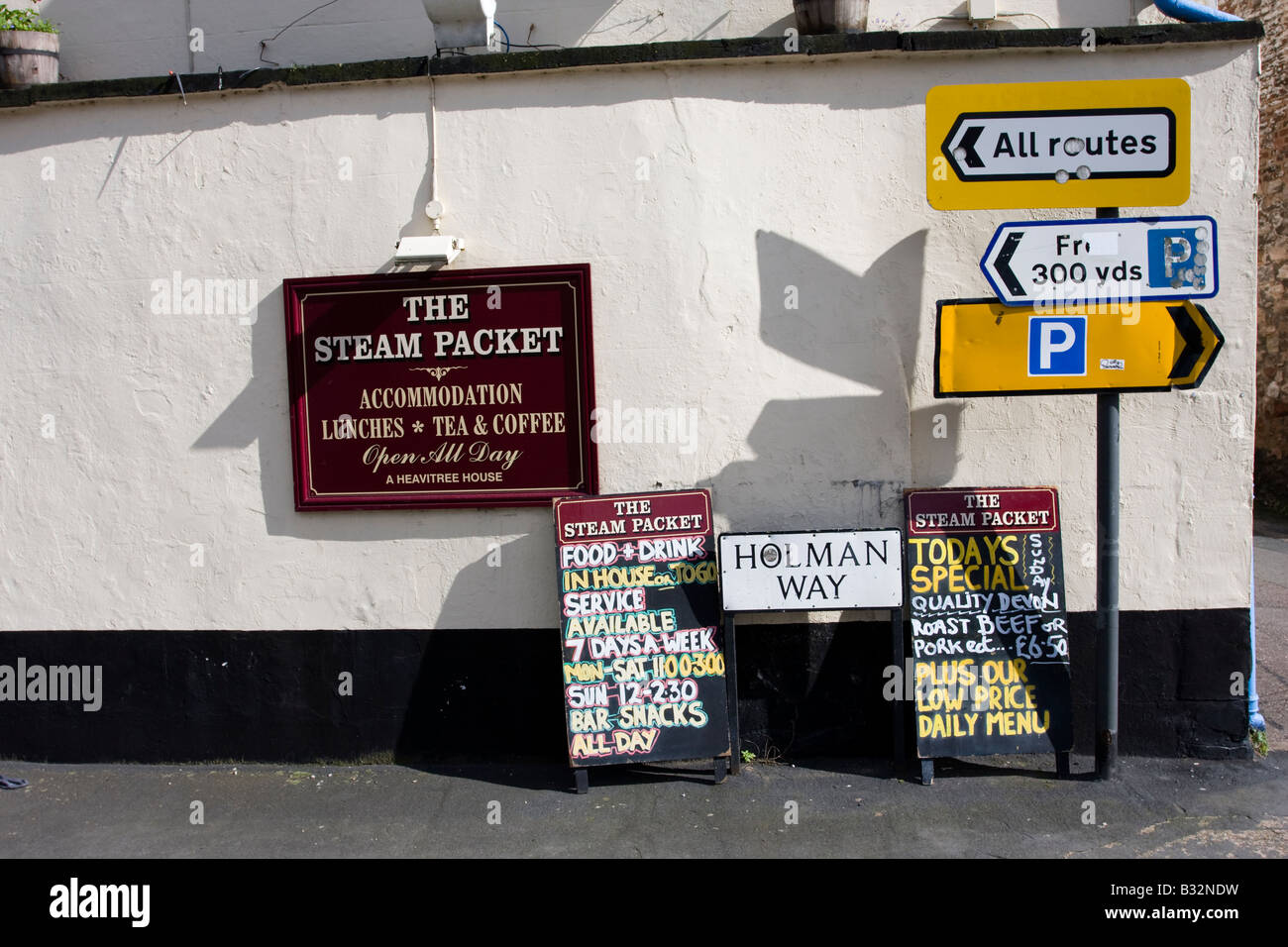 Signs on the side of a Pub in Topsham Road Directional Parking Menu ...