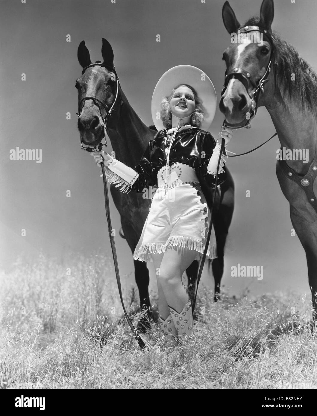 Cowgirls and horses Black and White Stock Photos & Images - Alamy