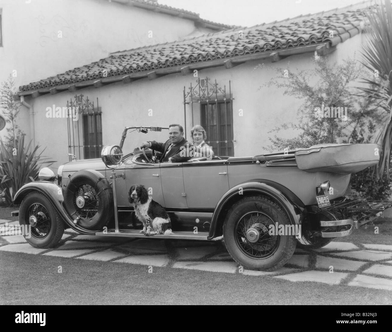 Cheerful couple on classic Black and White Stock Photos & Images - Alamy
