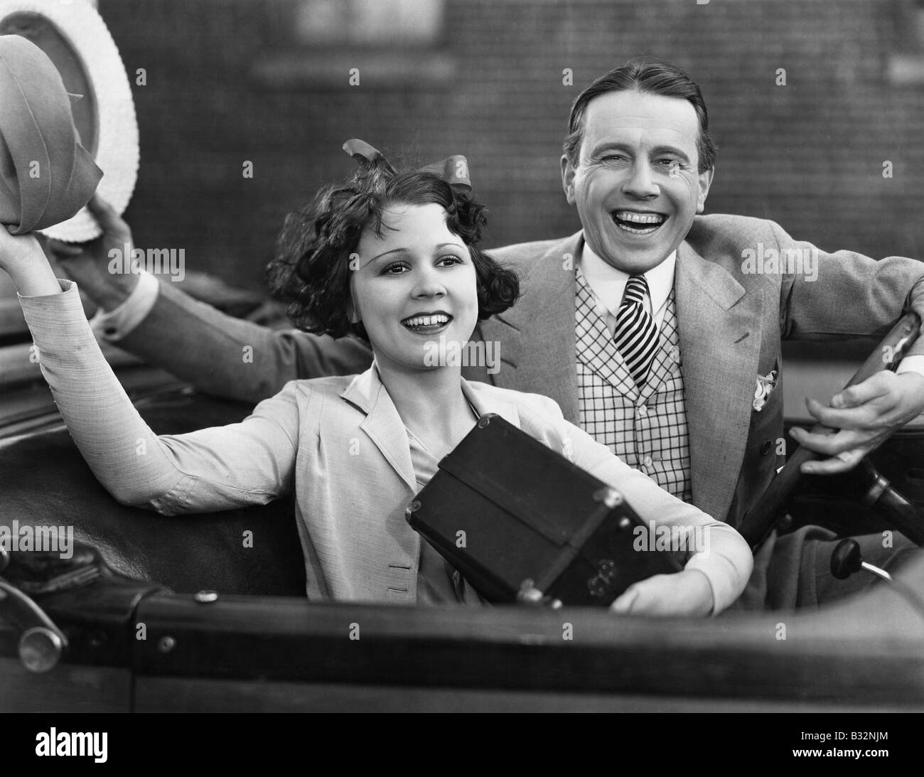 Smiling female in car Black and White Stock Photos & Images - Alamy