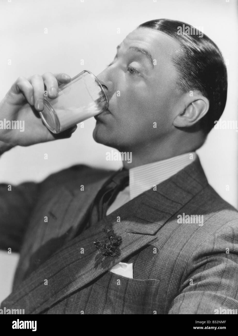 Man drinking beverage Stock Photo - Alamy