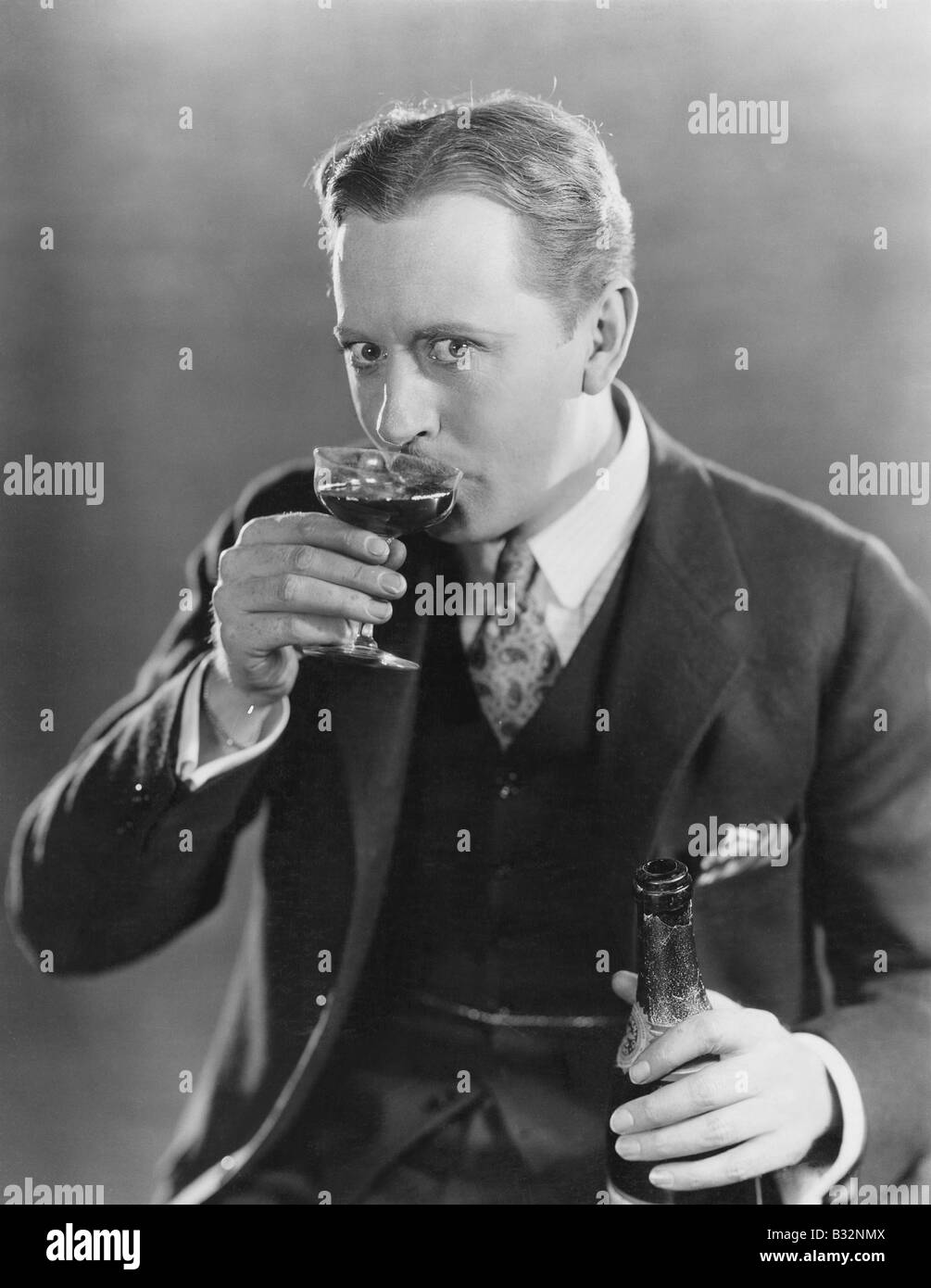 Portrait person drinking glass Black and White Stock Photos & Images ...
