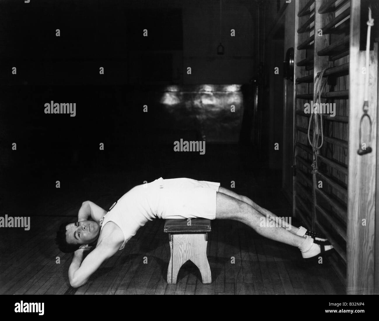 Strong handsome man exercising Black and White Stock Photos & Images ...