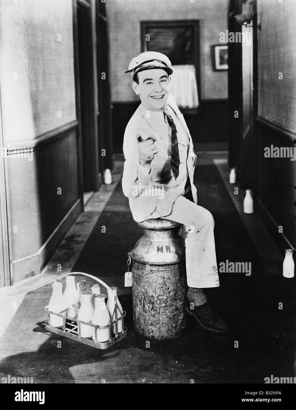 Portrait of happy milkman Stock Photo - Alamy