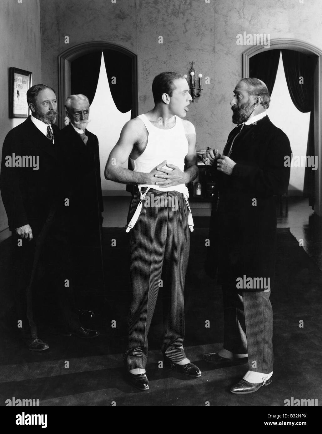 Examining observing Black and White Stock Photos & Images - Alamy