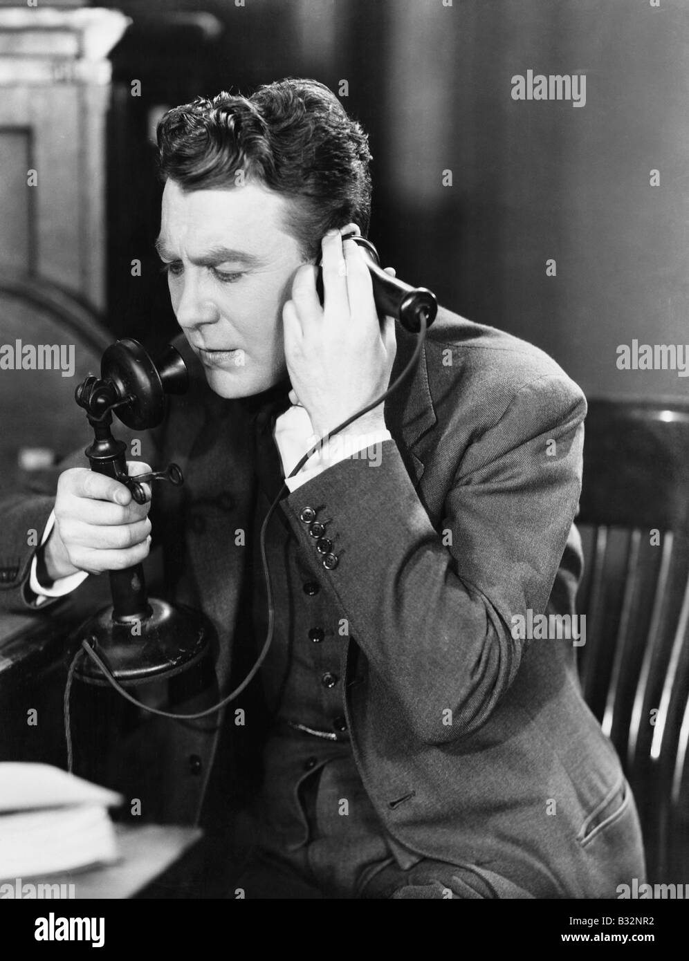 Man talking on telephone Stock Photo - Alamy Man talking on telephone Stock Photo - Alamy