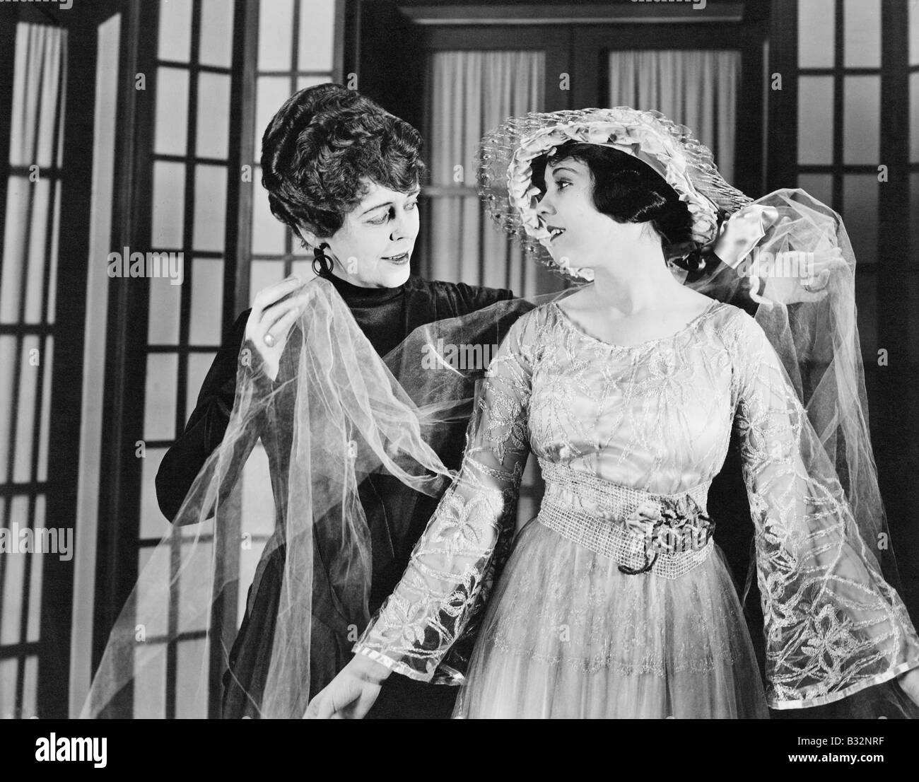 Two young women caring Black and White Stock Photos & Images - Alamy