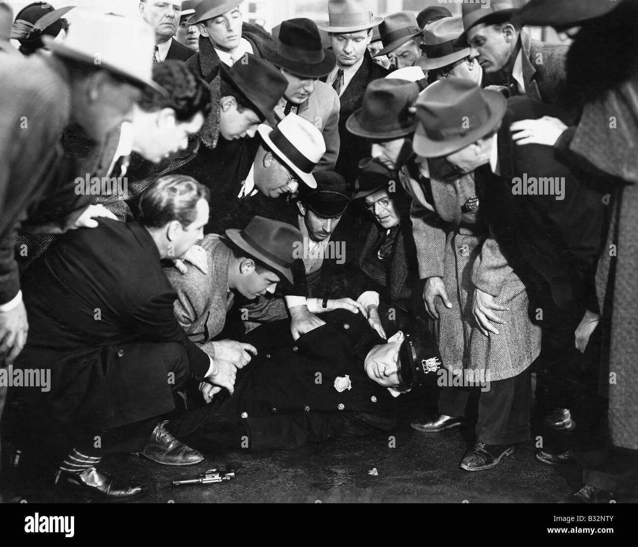 Young man surrounded crowd hi-res stock photography and images - Alamy