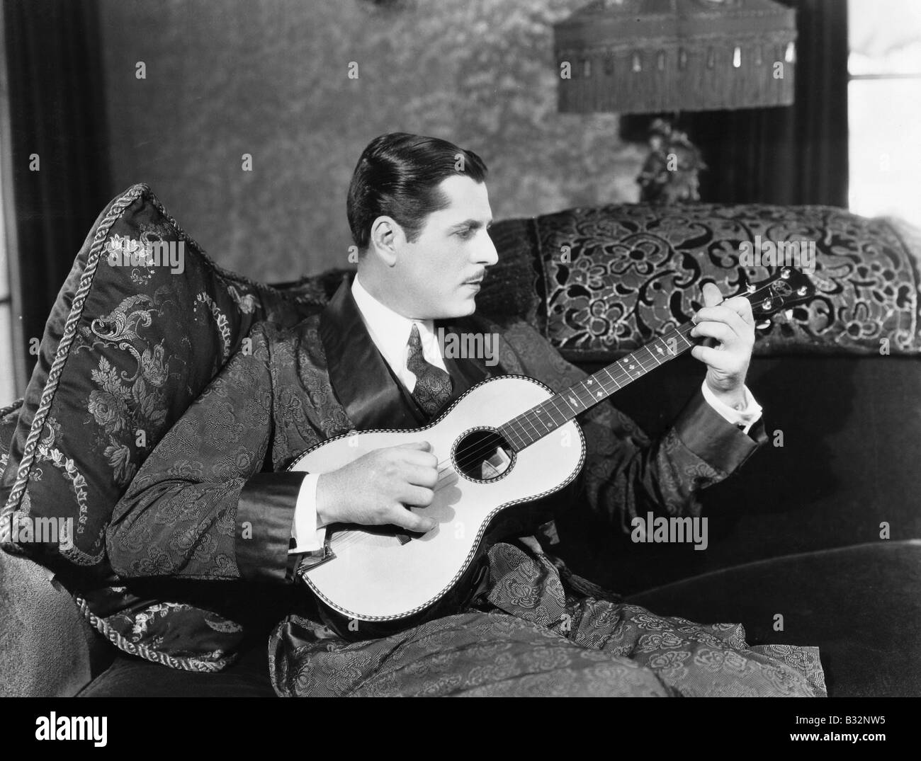 Historical guitar player hi-res stock photography and images - Alamy