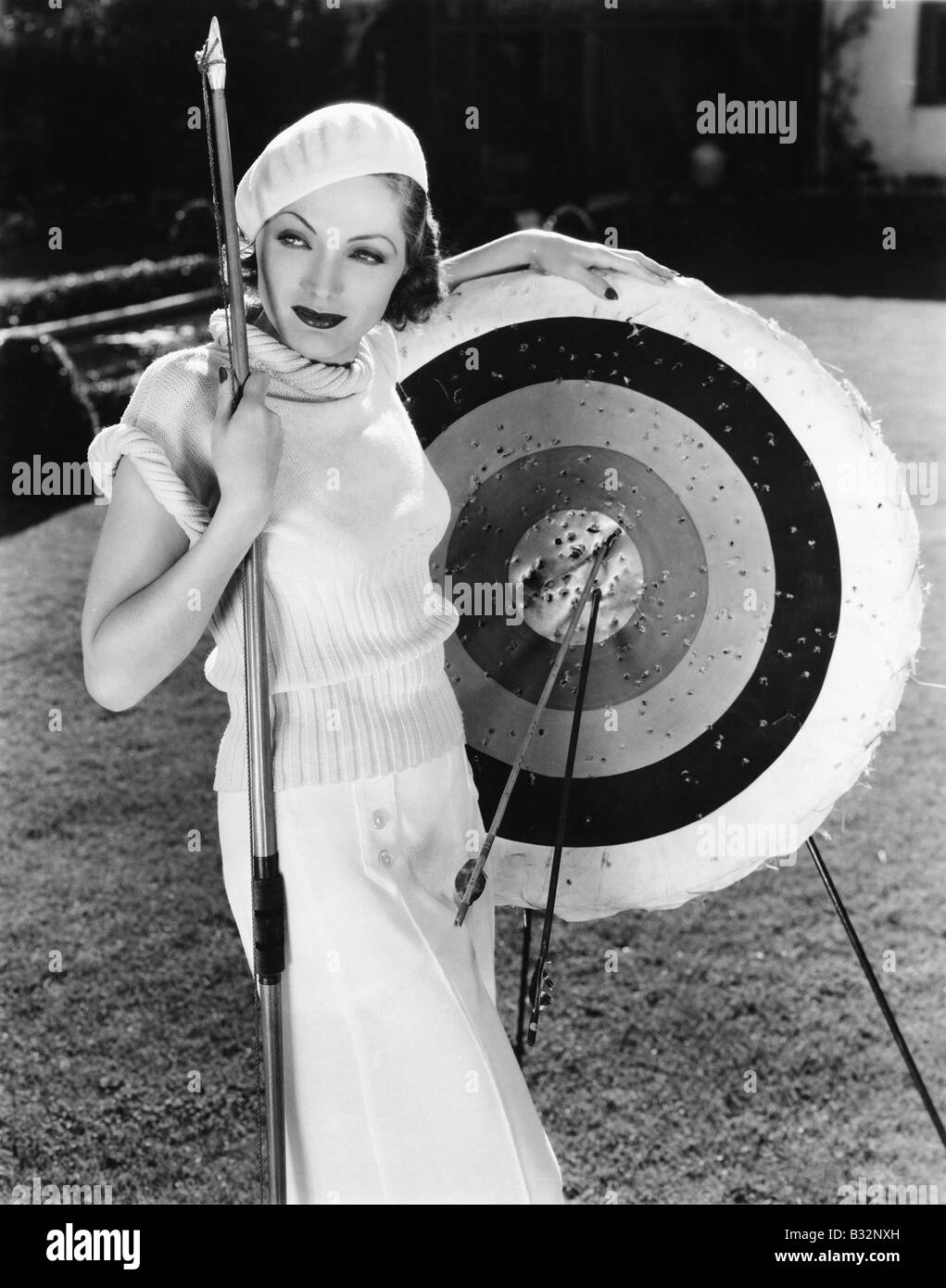 Female archer shot target Black and White Stock Photos & Images - Alamy