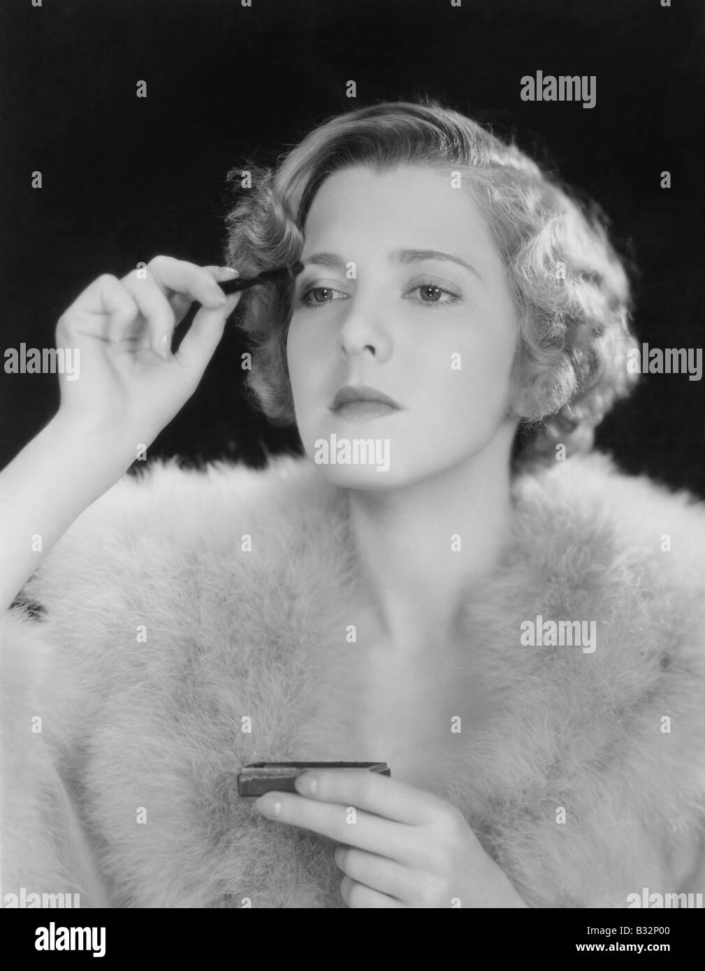 Eye makeup woman applying Black and White Stock Photos & Images - Alamy