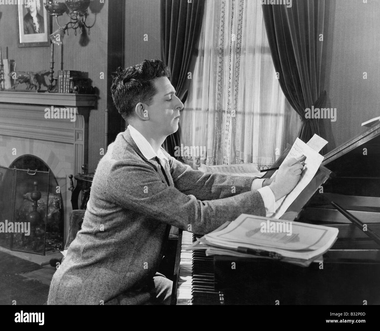 Musician play on piano Black and White Stock Photos & Images - Alamy