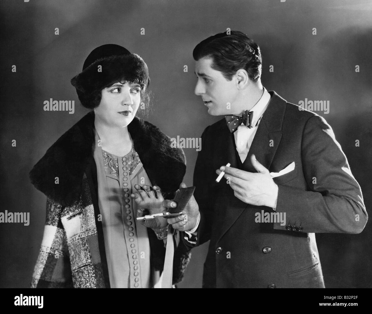 Sharing cigarettes hi-res stock photography and images - Alamy