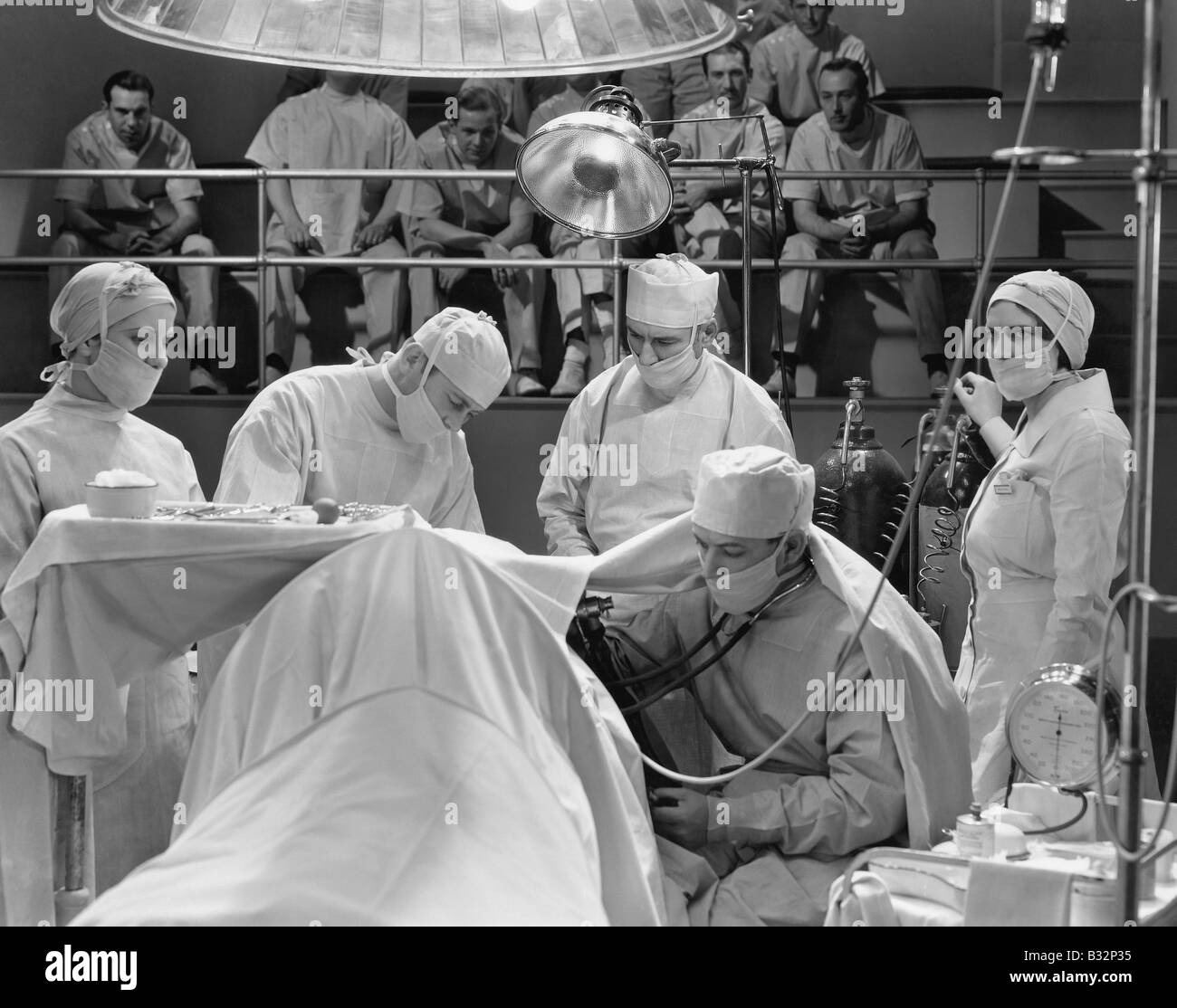 Focused operation Black and White Stock Photos & Images - Alamy