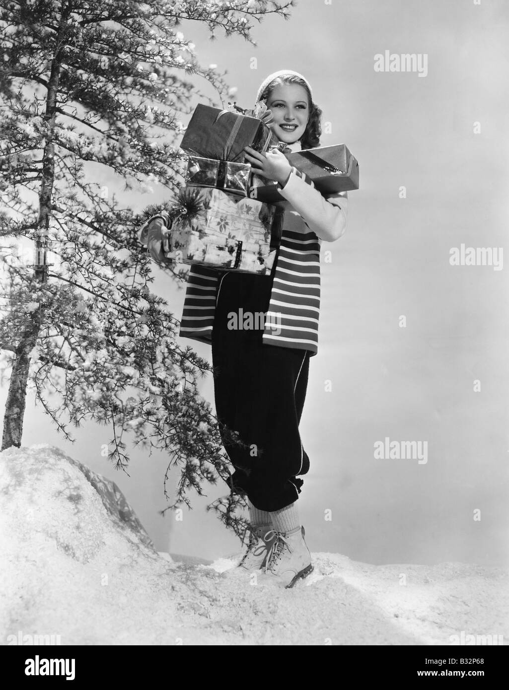 Woman in festive christmas Black and White Stock Photos & Images - Alamy