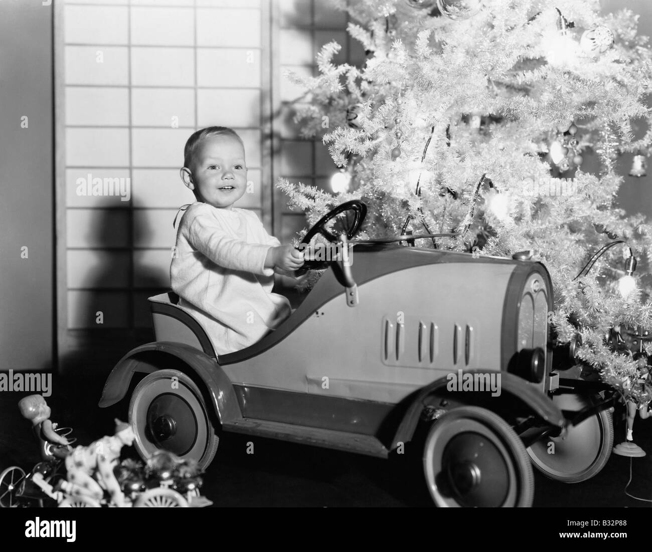 Gifts under the tree Black and White Stock Photos & Images - Alamy