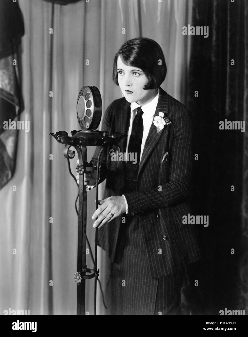 Female with microphone Black and White Stock Photos & Images - Alamy