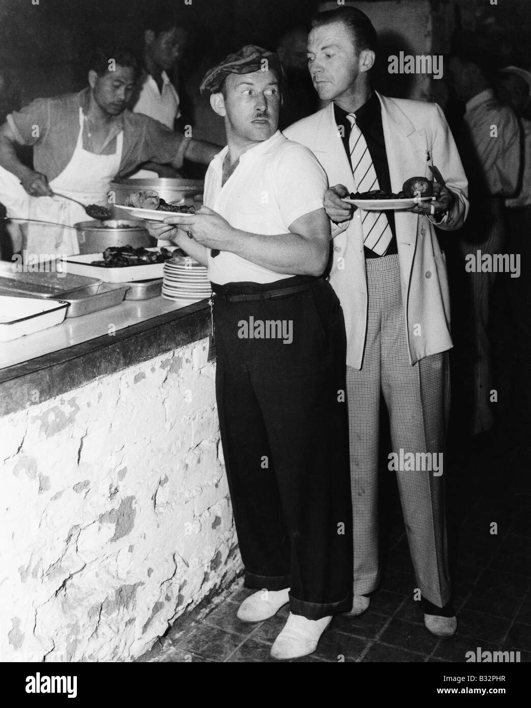 Men in food line Stock Photo - Alamy