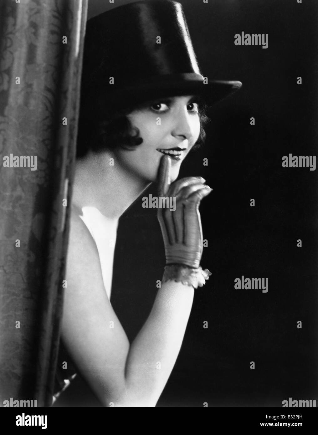 Top hat looking Black and White Stock Photos & Images - Alamy