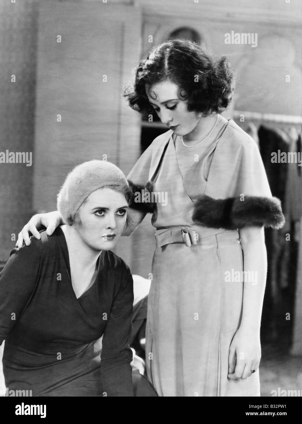 Woman consoling upset friend Stock Photo - Alamy