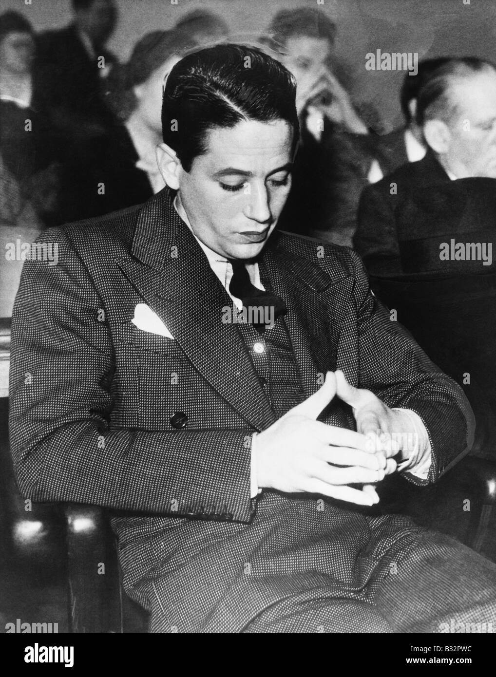 Young man in crowd Black and White Stock Photos & Images - Alamy