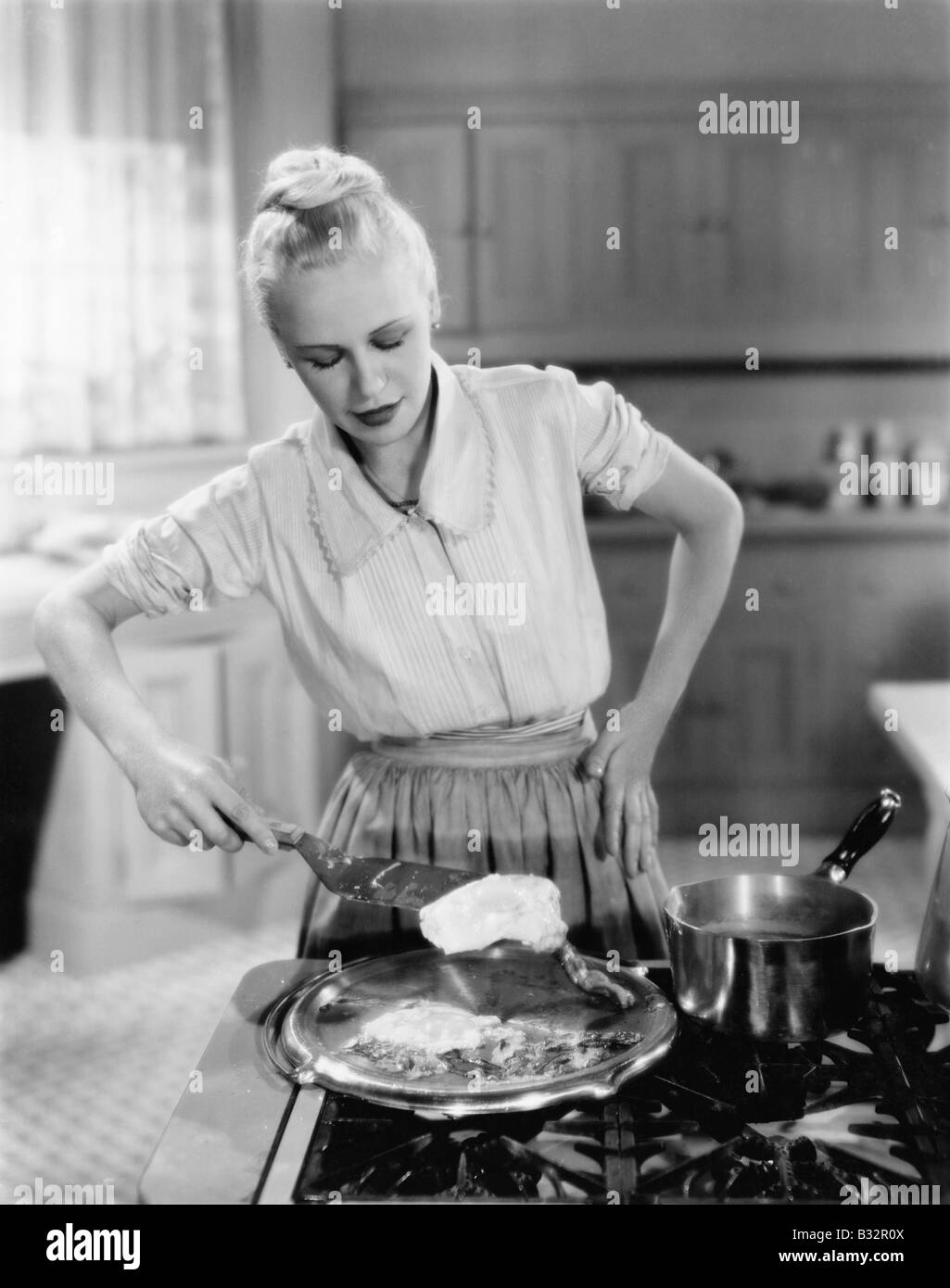 Egg on pan Black and White Stock Photos & Images - Alamy