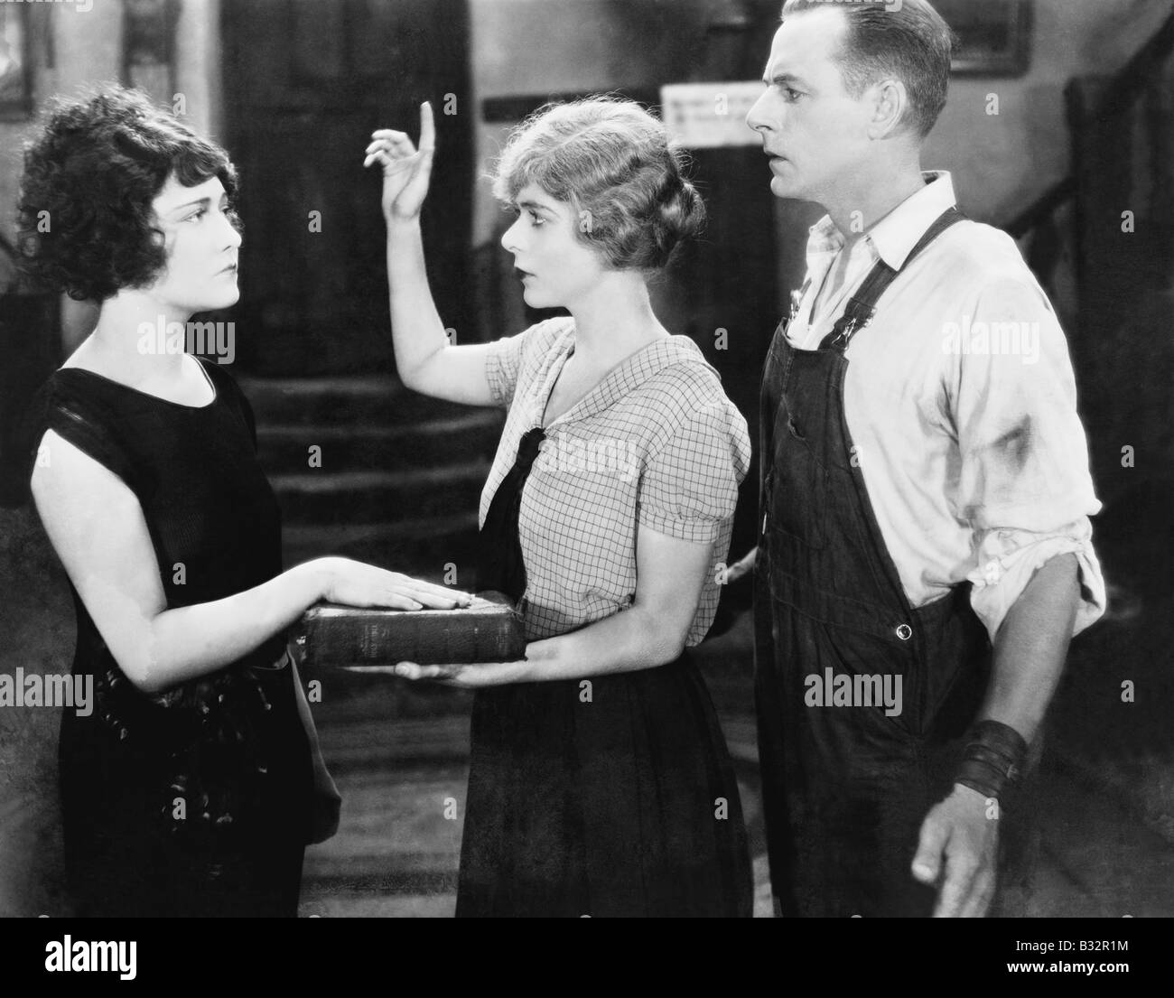 Bible in hand holy Black and White Stock Photos & Images - Alamy