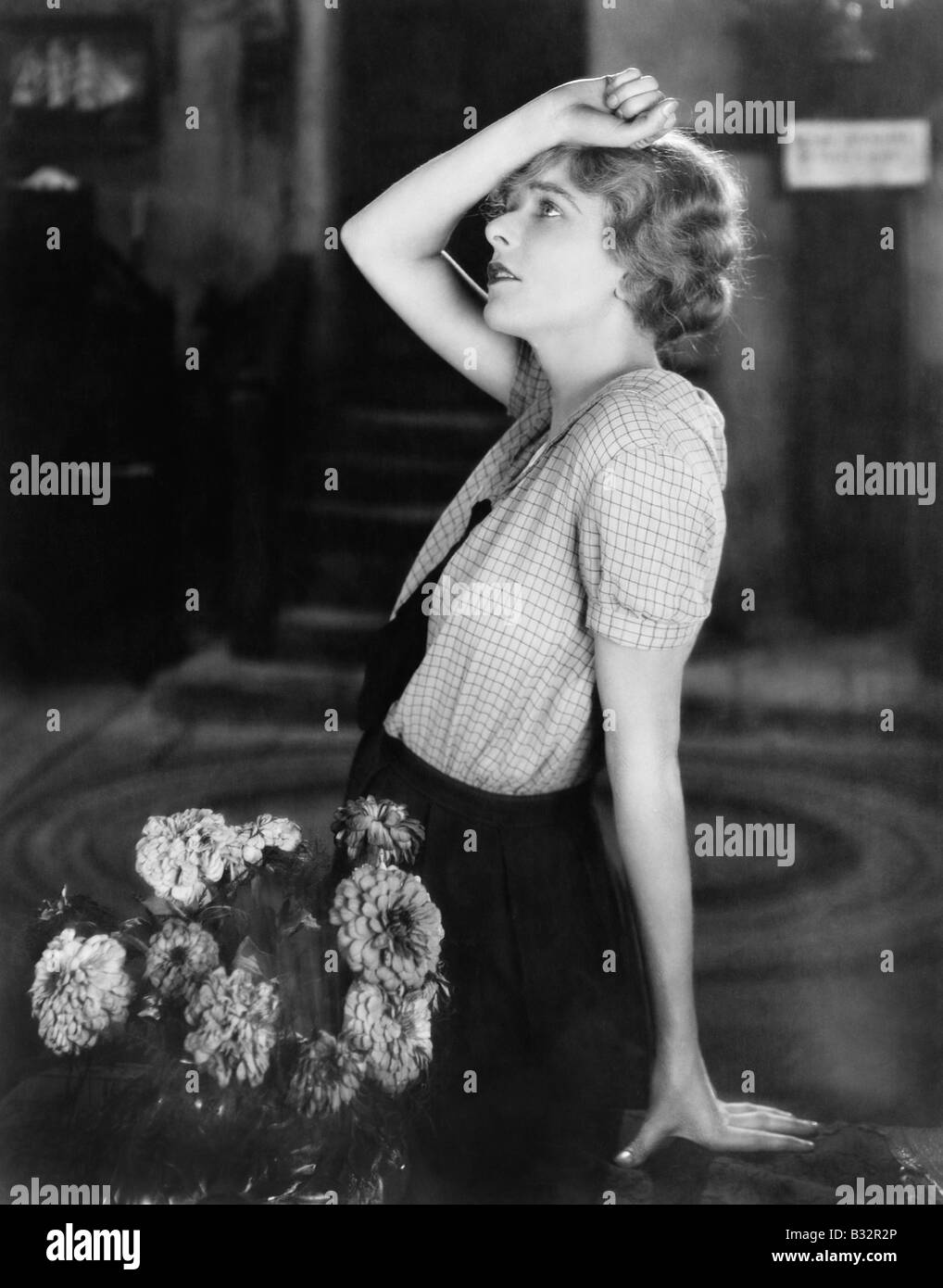 Young woman hand flowers Black and White Stock Photos & Images - Alamy