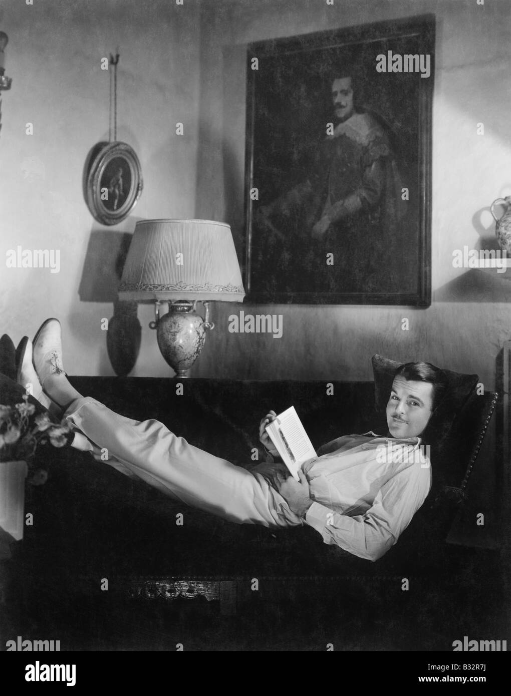 Man sitting on off Black and White Stock Photos & Images - Alamy