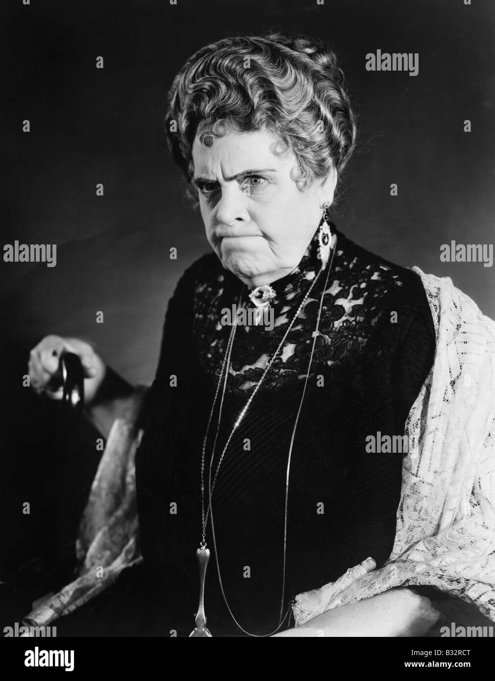 Stern looking woman Black and White Stock Photos & Images - Alamy