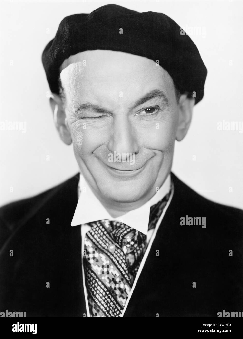 Portrait of a man winking Stock Photo - Alamy