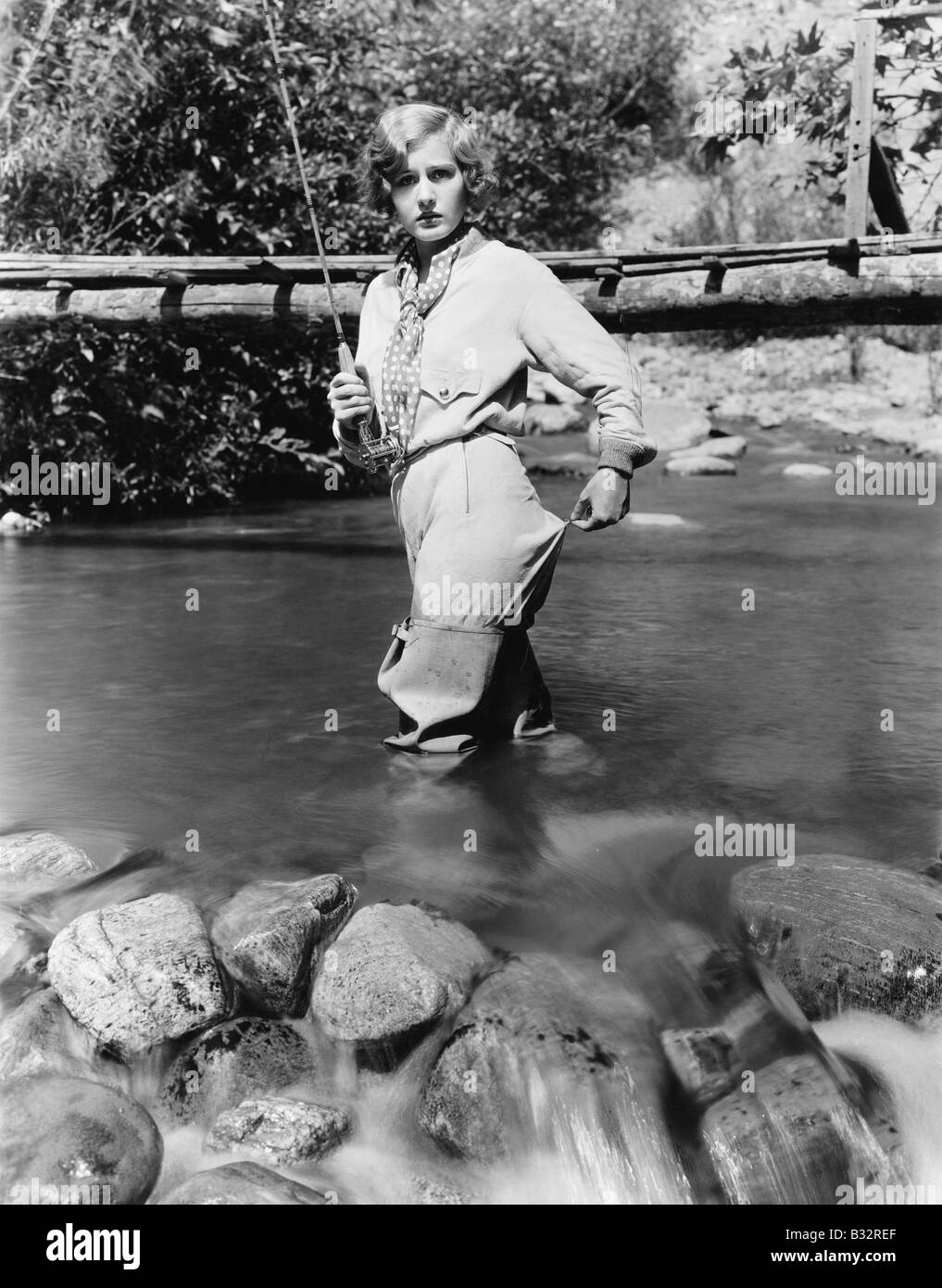 Fishing pole in rod Black and White Stock Photos & Images - Alamy