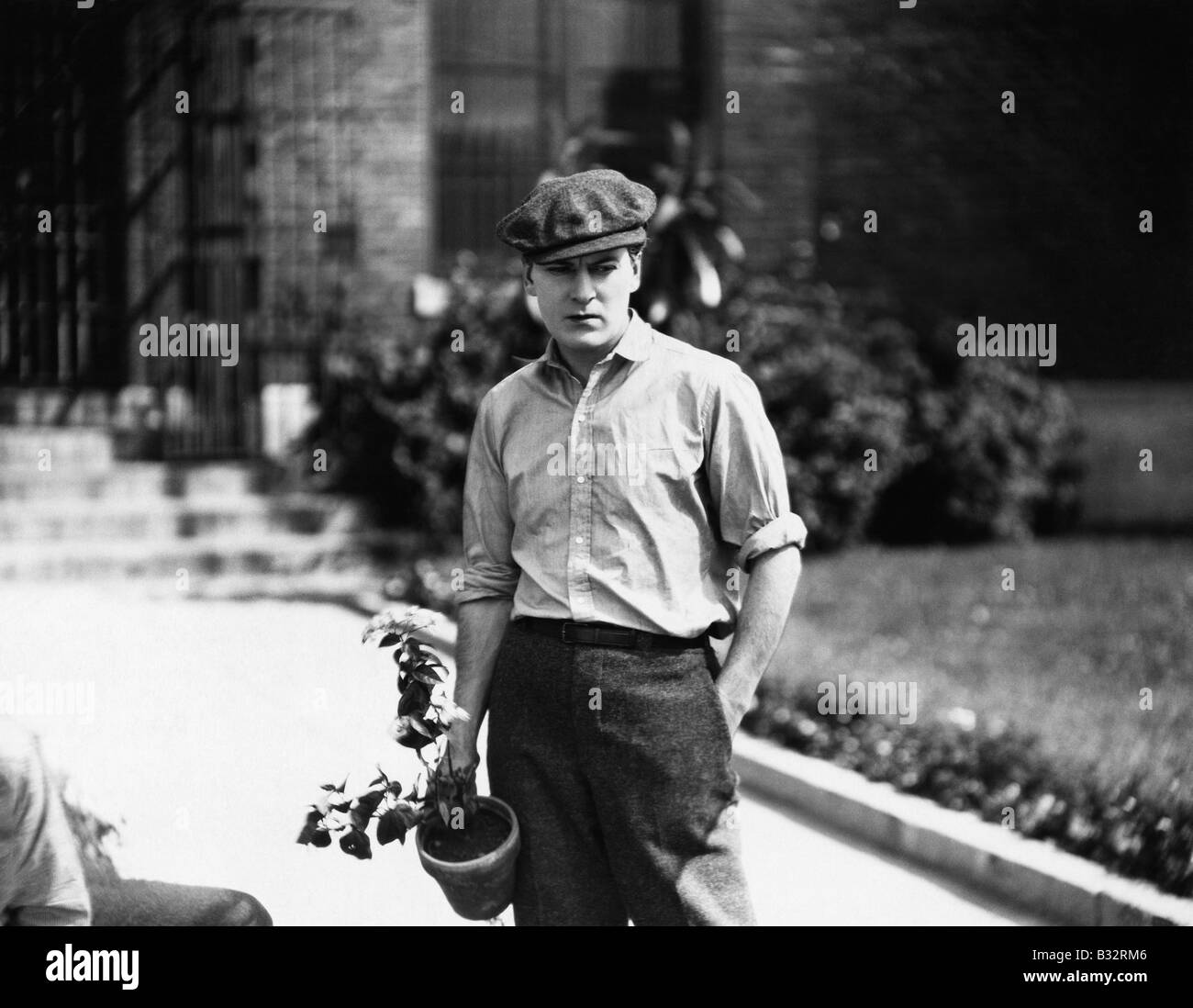 Men hand holding shirt Black and White Stock Photos & Images - Alamy