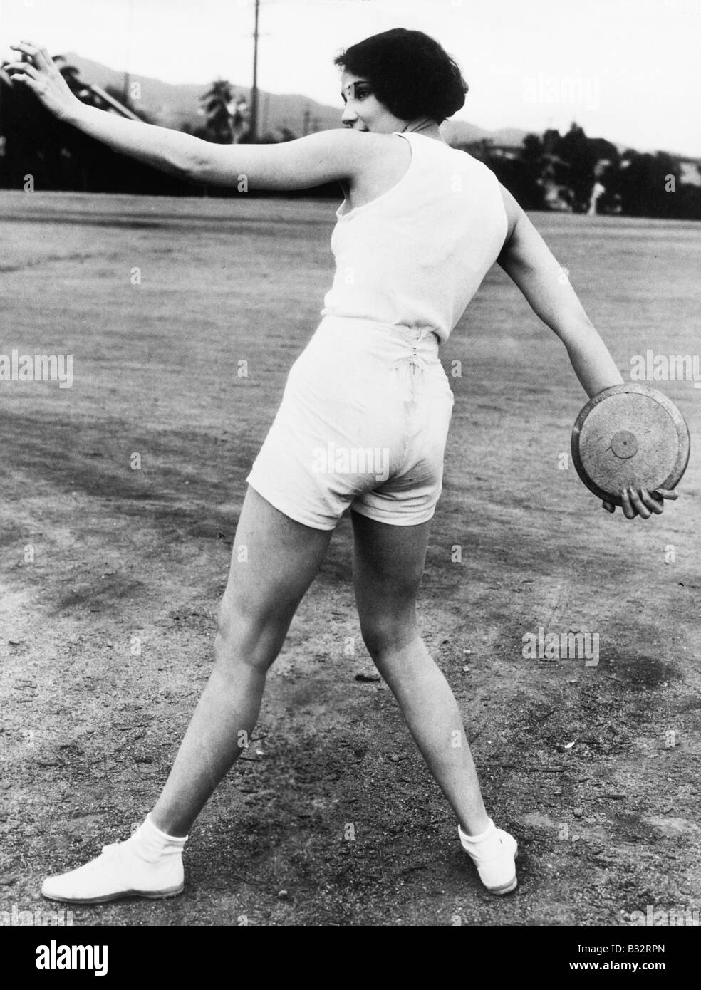 Throwing a discus Black and White Stock Photos & Images - Alamy