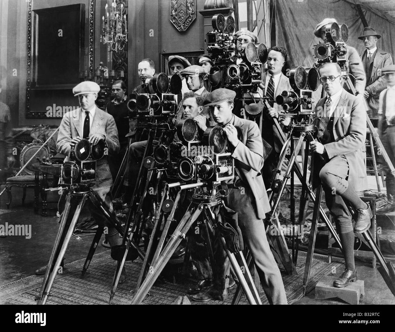 Group of photographers taking picture with cameras Stock Photo - Alamy