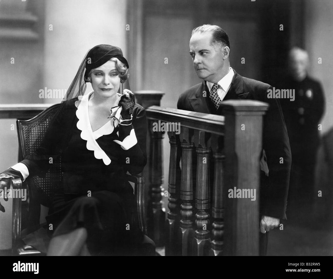 Young woman crying in a courtroom Stock Photo - Alamy