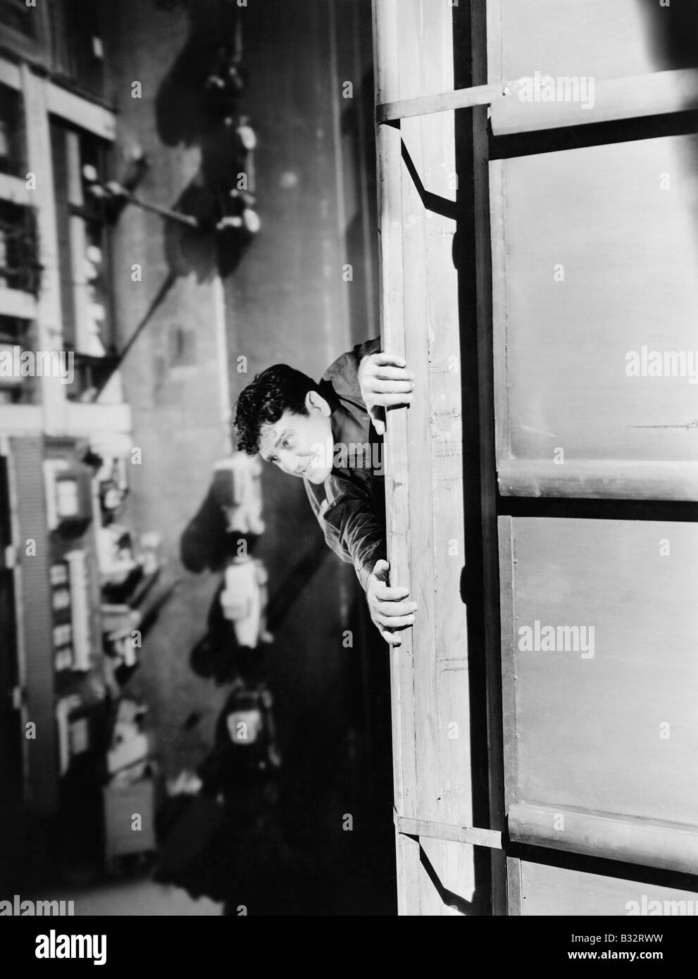 Hanging shoulders Black and White Stock Photos & Images - Alamy