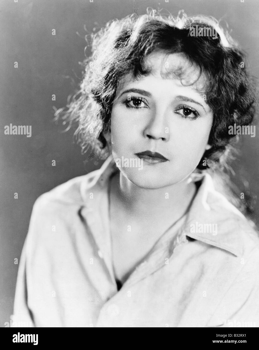 Woman looking serious Stock Photo - Alamy