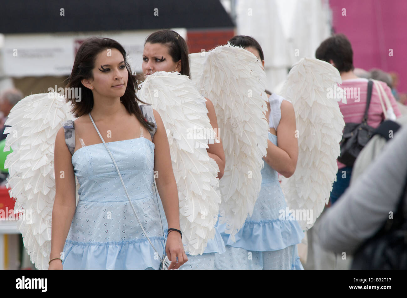 three young women dressed as angels at the National Eisteddfod of Wales ...