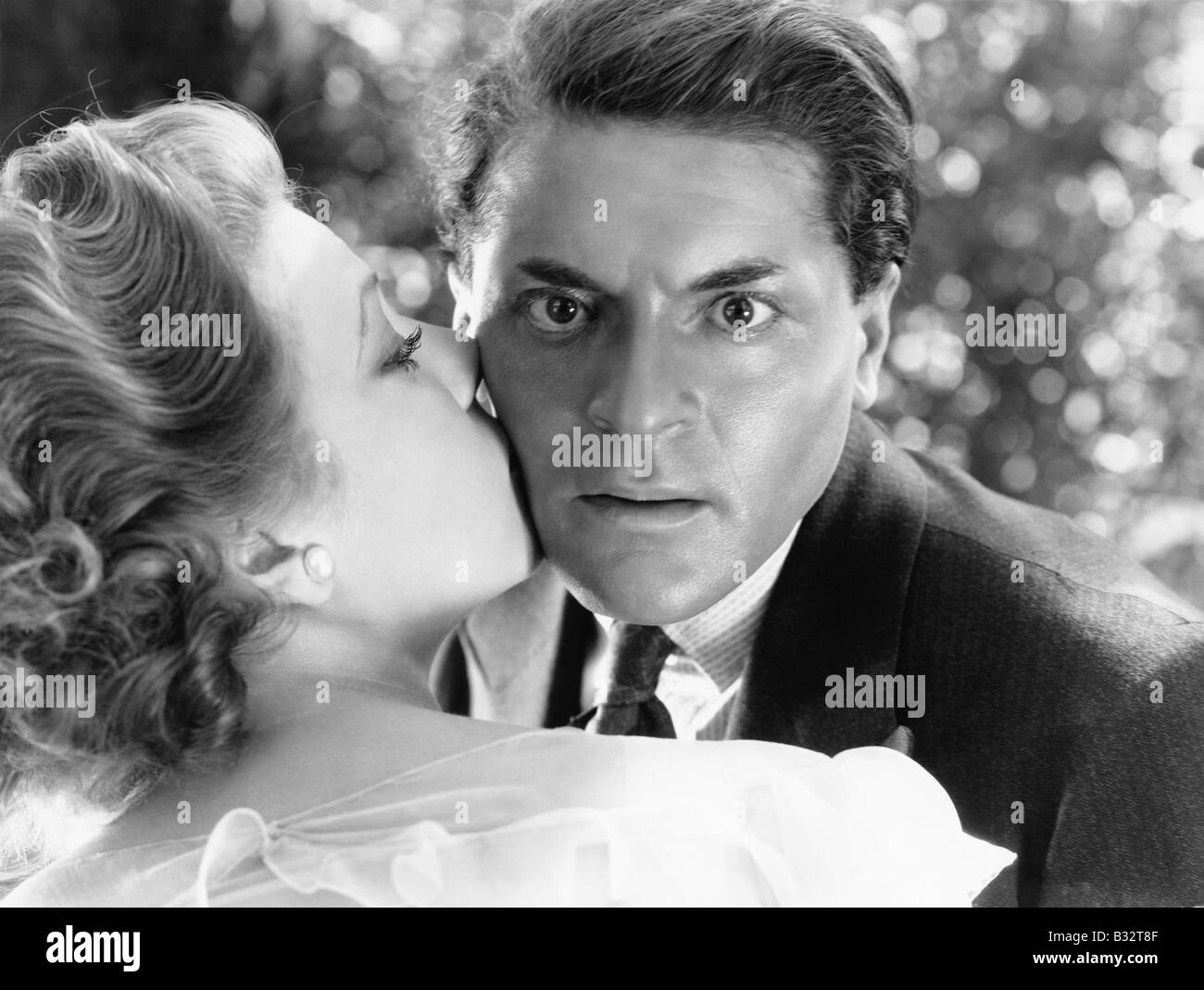 Man kissing woman bond Black and White Stock Photos & Images - Alamy