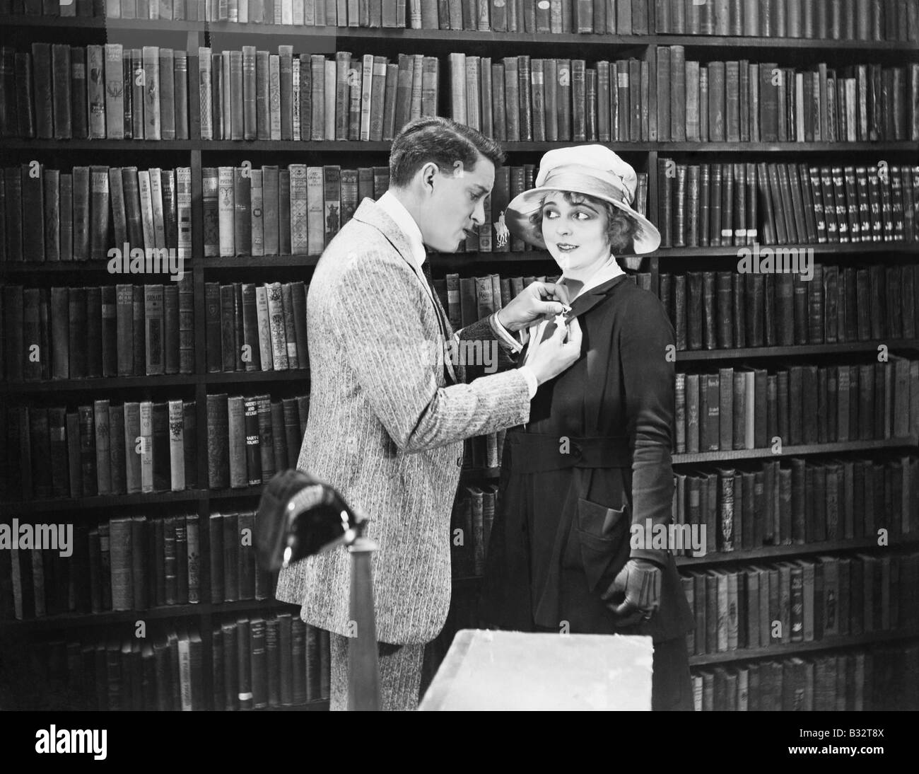 Young man in love standing Black and White Stock Photos & Images - Alamy