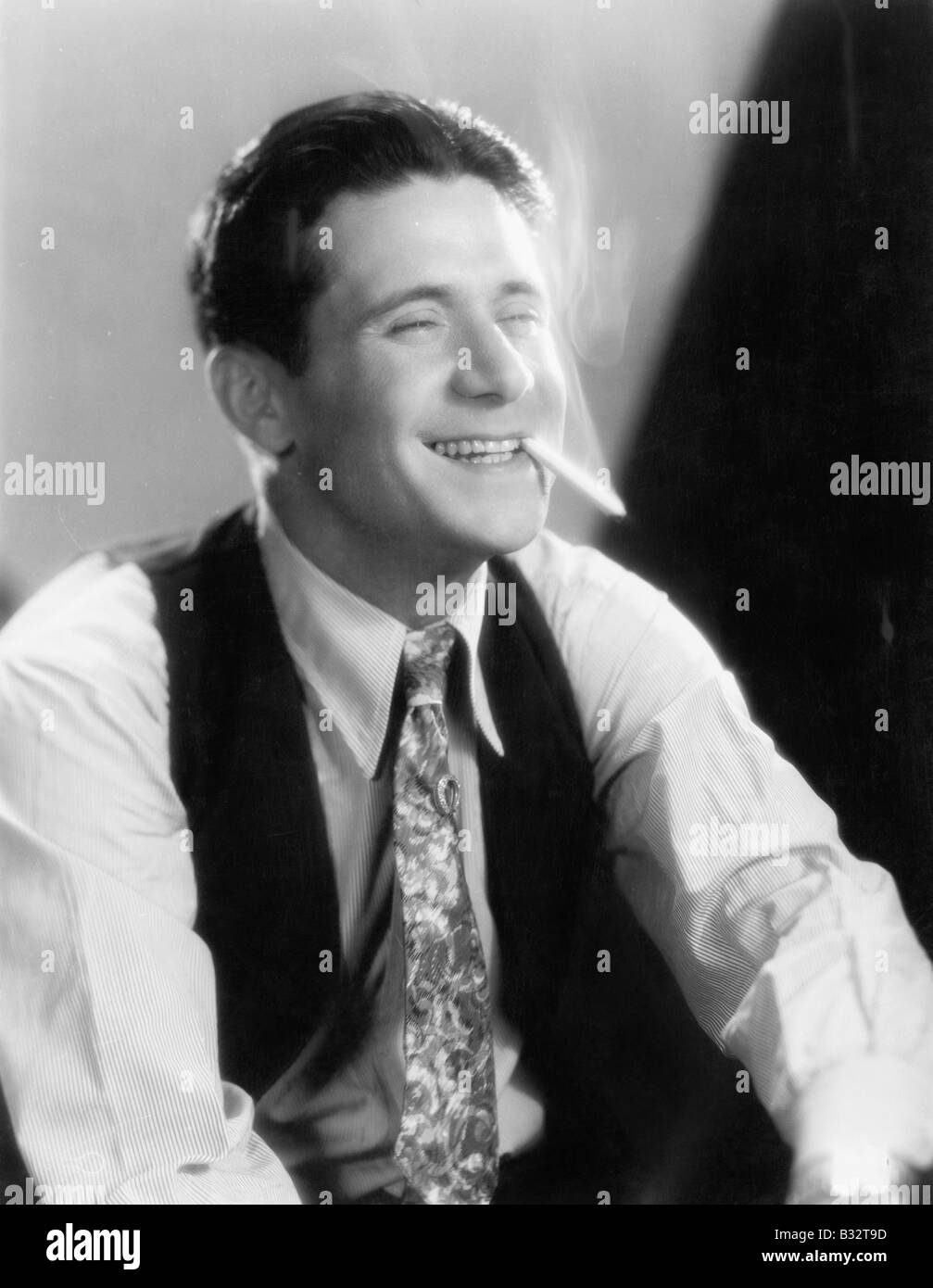 Young man laughing funny Black and White Stock Photos & Images - Alamy