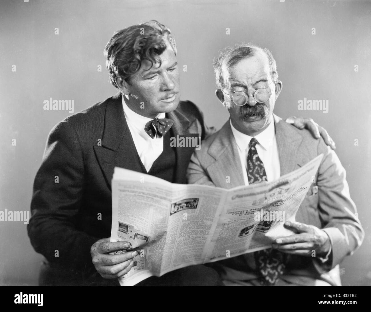 Reading two people Black and White Stock Photos & Images - Alamy