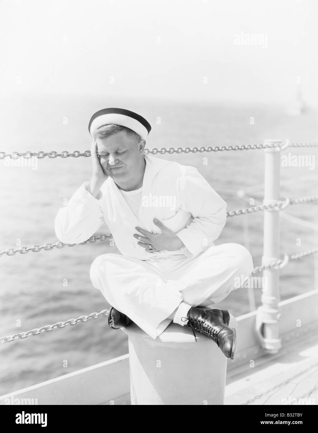 Sailor suffering from stomachache on the ship Stock Photo - Alamy