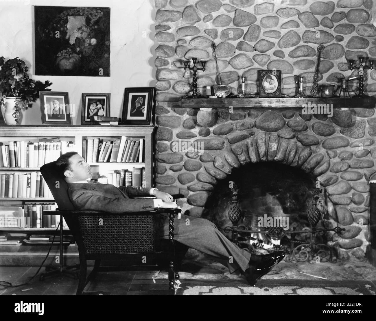 Man sits in cozy Black and White Stock Photos & Images - Alamy