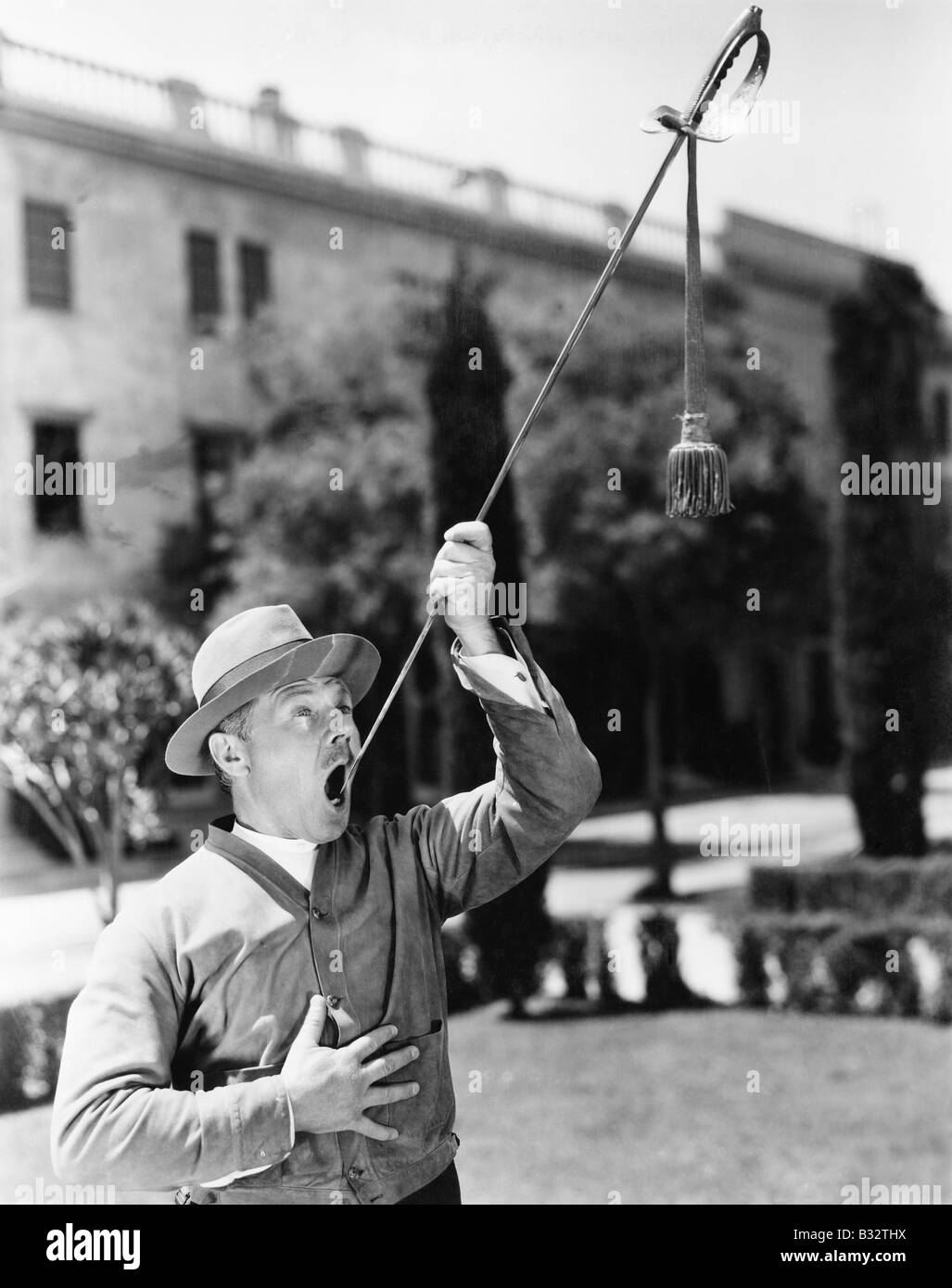 Sword swallowing hi-res stock photography and images - Alamy