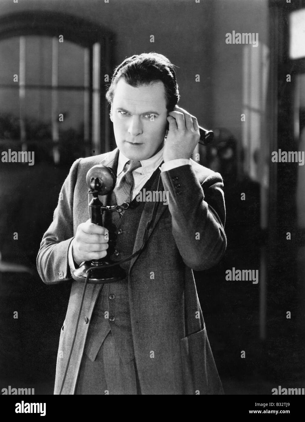 Man telephone serious Black and White Stock Photos & Images - Alamy