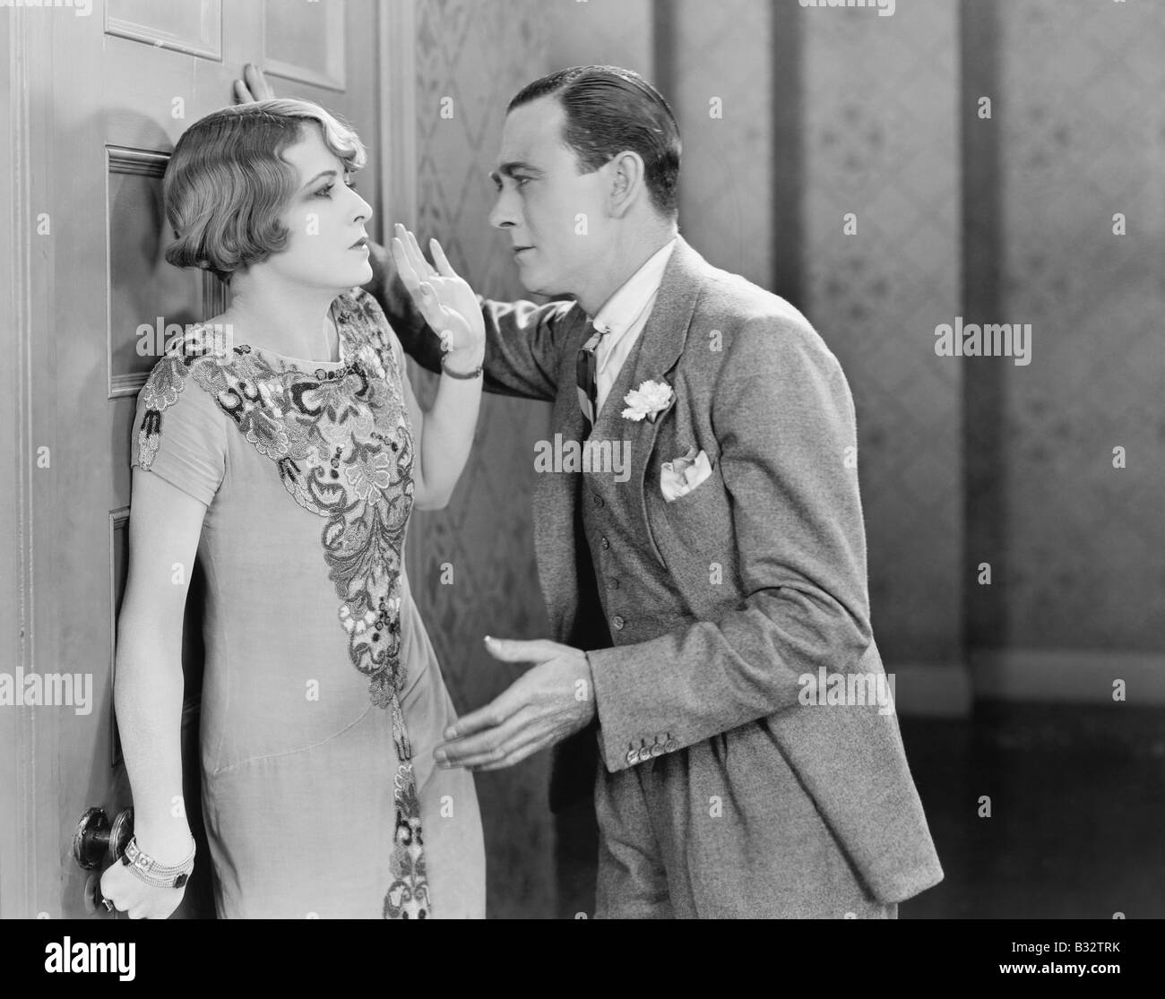 Man persuading woman hi-res stock photography and images - Alamy